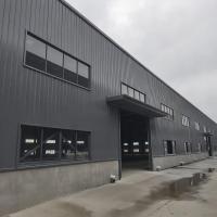 China Q235 Q345 Q355 Steel Grade Galvanized or Painted Surface Steel Structure Workshop with 200 Km/h Wind Load Portal Frame Workshop for sale