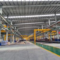 China Salt-spray Resistant Two Layer Steel Structure Workshop with Above 12 Grade Wind Resistance Prefabricated Steel Building for sale