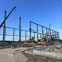 China Large Span Column-Free Steel Structure Warehouse with Engineer Guidance on Site and 50 Years Warranty Prefabricated Steel Building for sale