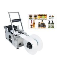 China Manual Sticker 450mm Pet Bottle Labelling Machine Semi Automatic 25kg for sale