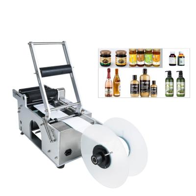 China Manual Sticker 450mm Pet Bottle Labelling Machine Semi Automatic 25kg for sale