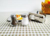 China Glass Salt and Pepper Shakers Set with 25g Capacity - Modern Round Design for Kitchen and Outdoor Use for sale