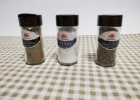 China 100ml Round Glass Spice Jars with Plastic Flip Caps - Customizable Kitchen Storage Containers for sale