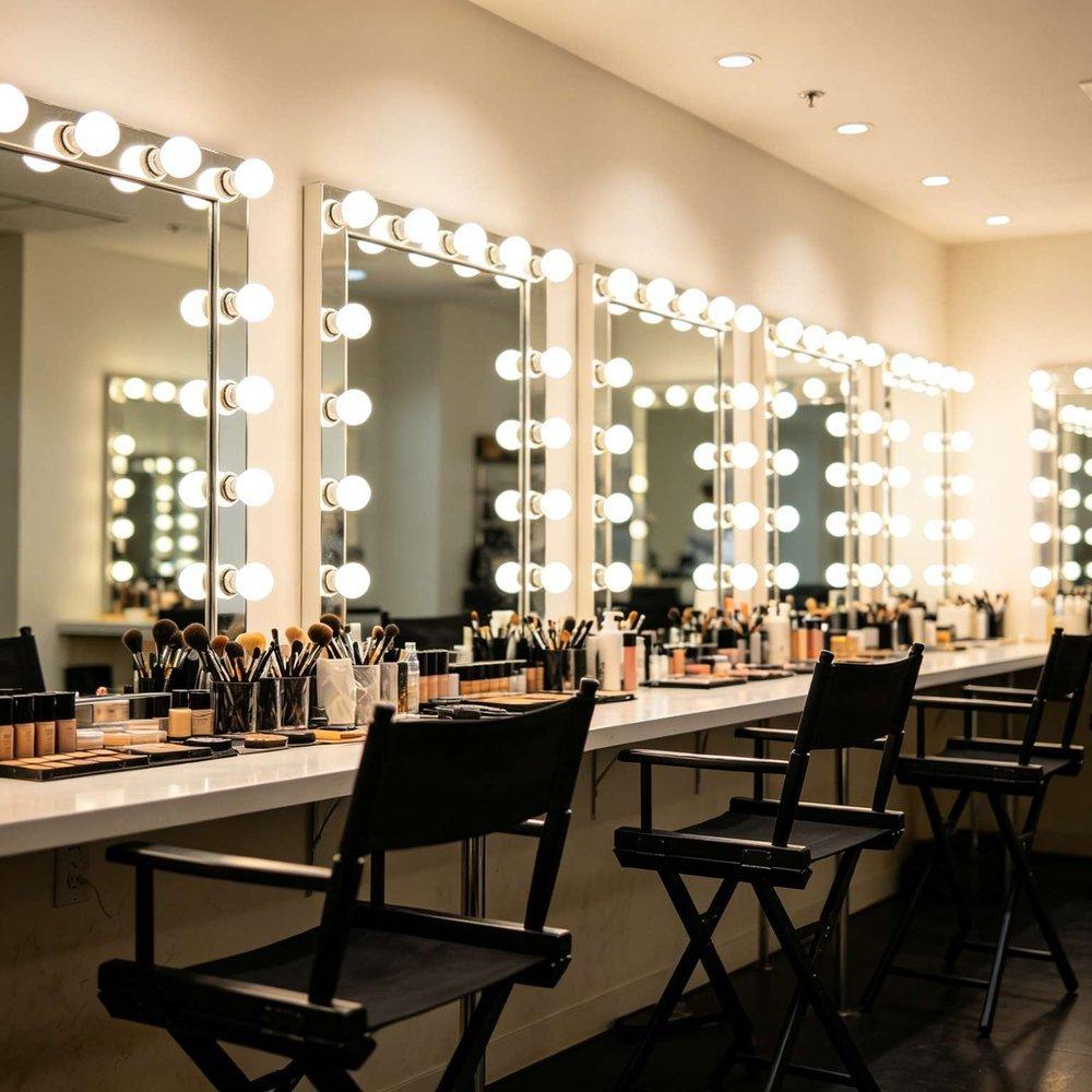 High-end makeup studio with Hollywood vanity mirrors