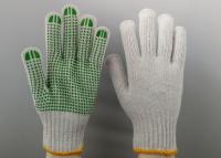 China 7 Gauge Polyester Knitted Safety Gloves with Green PVC Dotted Grips 1200G/Dozen for sale