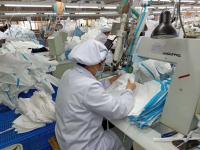 China Disposable PP PE Laminated Protective Coverall 65g Dustproof Waterproof Isolation Suit for sale