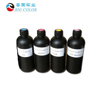 China CMYK W UV Inkjet Ink for Flatbed Printer TX800 1000ml Bottle Fast Curing for sale