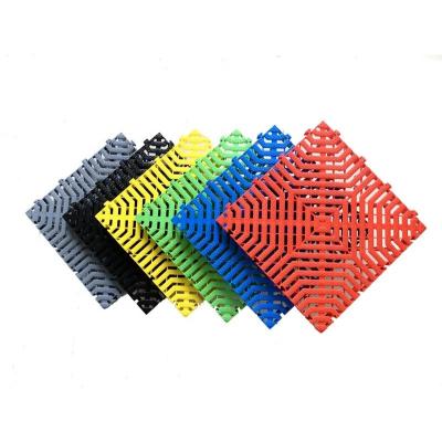 China 40x40x3.0cm PP Interlocking Mats for Indoor Carwash Garage Floor Covering 1-3 Ton Load for sale