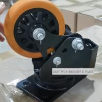 China 5 Inch Horizontal Spring Shock Absorbing Swivel Caster – Orange PU Plastic Core Wheel 250kg Load Cast Iron Bracket & Plate for sale