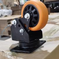China 5 Inch Horizontal Spring Shock Absorbing Swivel Caster – Orange PU Plastic Core Wheel 250kg Load Cast Iron Bracket & Plate for sale