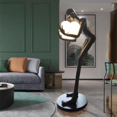 China Postmodern Humanoid Floor Lamp Sculpture Holding Ball Model Art Designer Hotel Lobby Living Room Floor Lamp(WH-MFL-90) for sale