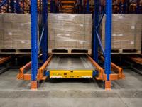 China 1200kg Remote Controlled Two-Way Pallet Shuttle for Deep-Lane Pallet Storage for sale