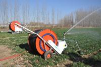 China Advanced Irrigation System Direct Agricultural Hose Reel Sprinkler Traveling Irrigator for Effective Farm Irrigation for sale