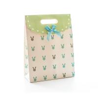 China Boutique Craft Coloured Paper Gift Bags With Self Adhesive Ribbon for sale