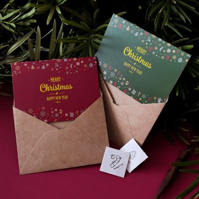 China Colorful Chrismas Custom Foil Greeting Cards With Envelope Sticker for sale