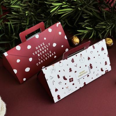 China Cardboard Origami Wedding Festival Triangle Gift Box With Handles for sale