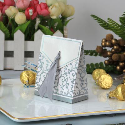 China 0.5kg 300g Artpaper Coloured Paper Gift Bags With Ribbon Handles for sale