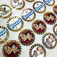 China Adhesive Printable Foil Sticker Paper CMYK Clear Foil Labels for sale