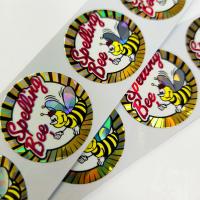 China Adhesive Printable Foil Sticker Paper CMYK Clear Foil Labels for sale