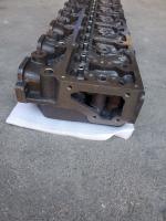 China 11039-06J00 Nissan Engine Cylinder Head Model TD42 Is Made Of Cast Iron for sale