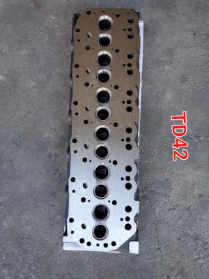 China 11039-06J00 Nissan Engine Cylinder Head Model TD42 Is Made Of Cast Iron for sale