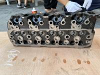 China ME997799 Mitsubishi Engine Cylinder Head Model 4d36 Material Casting for sale