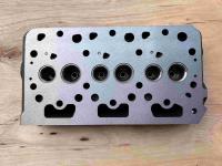 China 16689-03049 The Kubota Engine Cylinder Head Model D722 Is Made Of Cast Iron for sale