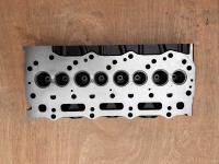 China 111017930 Perkins Cylinder Head Model 404c Material Casting Cylinder Head for sale