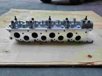 China MD185918 Mitsubishi Cylinder Head Model 4d56-C Material Casting Cylinder Head for sale