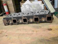 China 32A01-01010 Mitsubishi Cylinder Head Model S4s Casting Engine Cylinder Head for sale