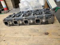 China 32A01-01010 Mitsubishi Cylinder Head Model S4s Casting Engine Cylinder Head for sale