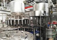 China Small Scale 32  Filling Head Mango Juice Bottling Machine for sale