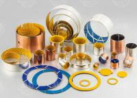 China JS-20 Self-Lubricating Bronze Graphite Bushings with POM+MoS2 Lubricating Layer for High Load Applications for sale