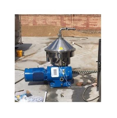 China 500 KG Capacity 1000L/H Milk Cream Separator with Automatic Cleaning 2200*1350*1150mm for sale