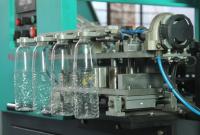 China 25kW Automatic PET Juice Bottle Blowing Moulding Machine for Juice Processing Machine for sale