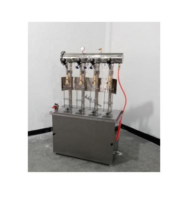 China 2000BPH Semi Automatic Mineral Water Carbonated Drinks Beer Bottle Filling Machine for sale