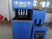 China Stretch Blow Moulding Auto Dropping Semi Automatic 4 Cavity Soda Water Bottle Blow Molding Machine for sale