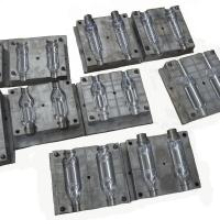 China Semi Automatic Two Cavity Plastic Blowing Bottle Mould for Making PET Bottles for sale