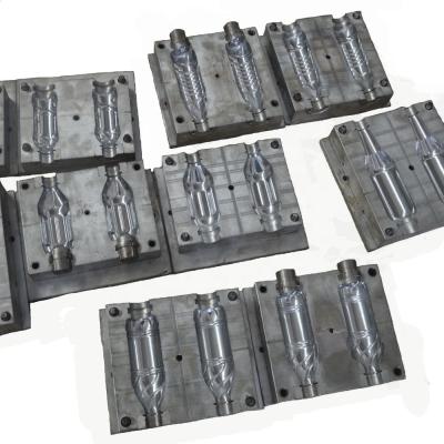 China Semi Automatic Two Cavity Plastic Blowing Bottle Mould for Making PET Bottles for sale