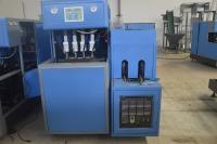China 1250 KG Weight Hand Operate 4 Cavities Pure Water Bottle Blow Mould Machine 220V/380V/415V/440V/480V Voltage for sale