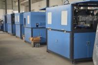 China 4000-4500 pcs Theoretical Output Four Cavity Spring Water Bottle Blow Molding Machine for sale