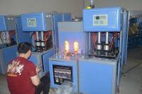 China Manufacturing Plant Semi-auto 2000B/H One Heater Pull Two Blow Moulding Machine Weight KG 1250 KG for sale