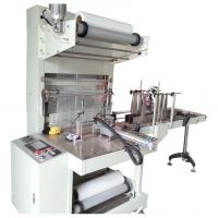 China Semi Automatic Oil Bottles Wrapping Machine with Heat Shrink Tunnel and PE Film Type for sale