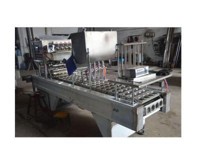 China Fully Automatic Flavored Yogurt Cup Filling And Sealing Machine With 100% Filling Accuracy for sale