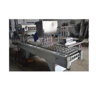 China Fully Automatic Flavored Yogurt Cup Filling And Sealing Machine With 100% Filling Accuracy for sale