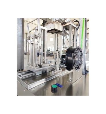China Plastic Packaging Manual Type Juice Gable Top Carton Filling Machine for Bottles for sale