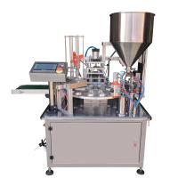 China 2 Hole Rotary Cup Juice Filling and Sealing Machine for 380 KG Capacity Packaging Line for sale