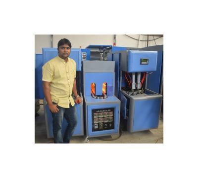 China Oil Packaging 2 Cavity Semi Auto Oil Bottle Blowing Machine with 50kN Clamping Force for sale