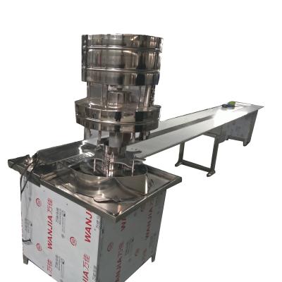 China Plastic Bottles Packaging Type 12 Nozzle Semi Automatic Aqua Bottle Filling Machine for sale
