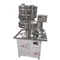 China Plastic Bottles Packaging Type 12 Nozzle Semi Automatic Aqua Bottle Filling Machine for sale